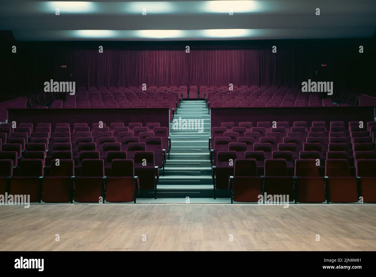Empty cinema hall with red seats amd stage. Movie theatre Stock Photo ...