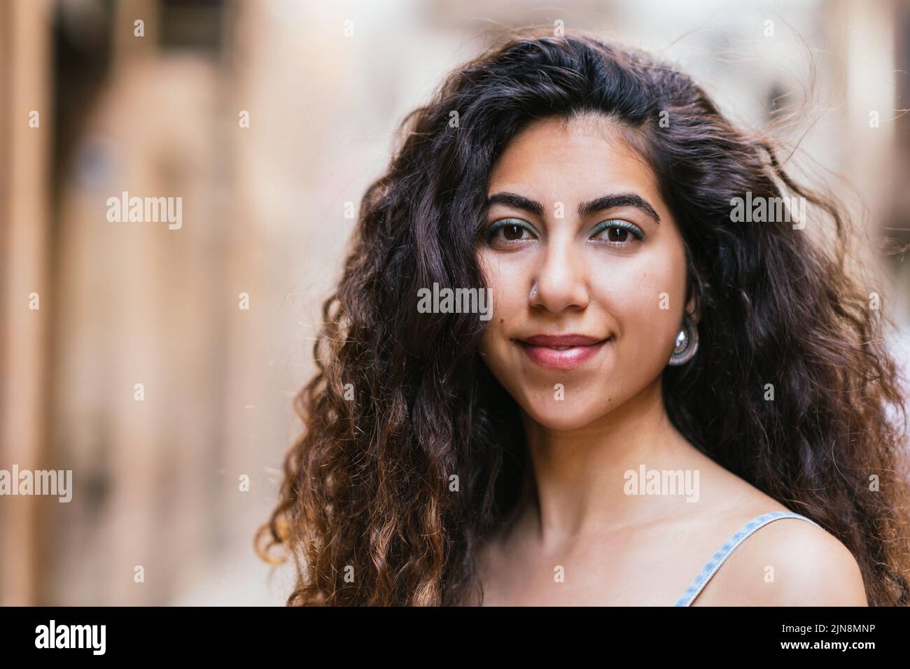 horizontal portrait of an attractive turkish woman dressing denim dress ...