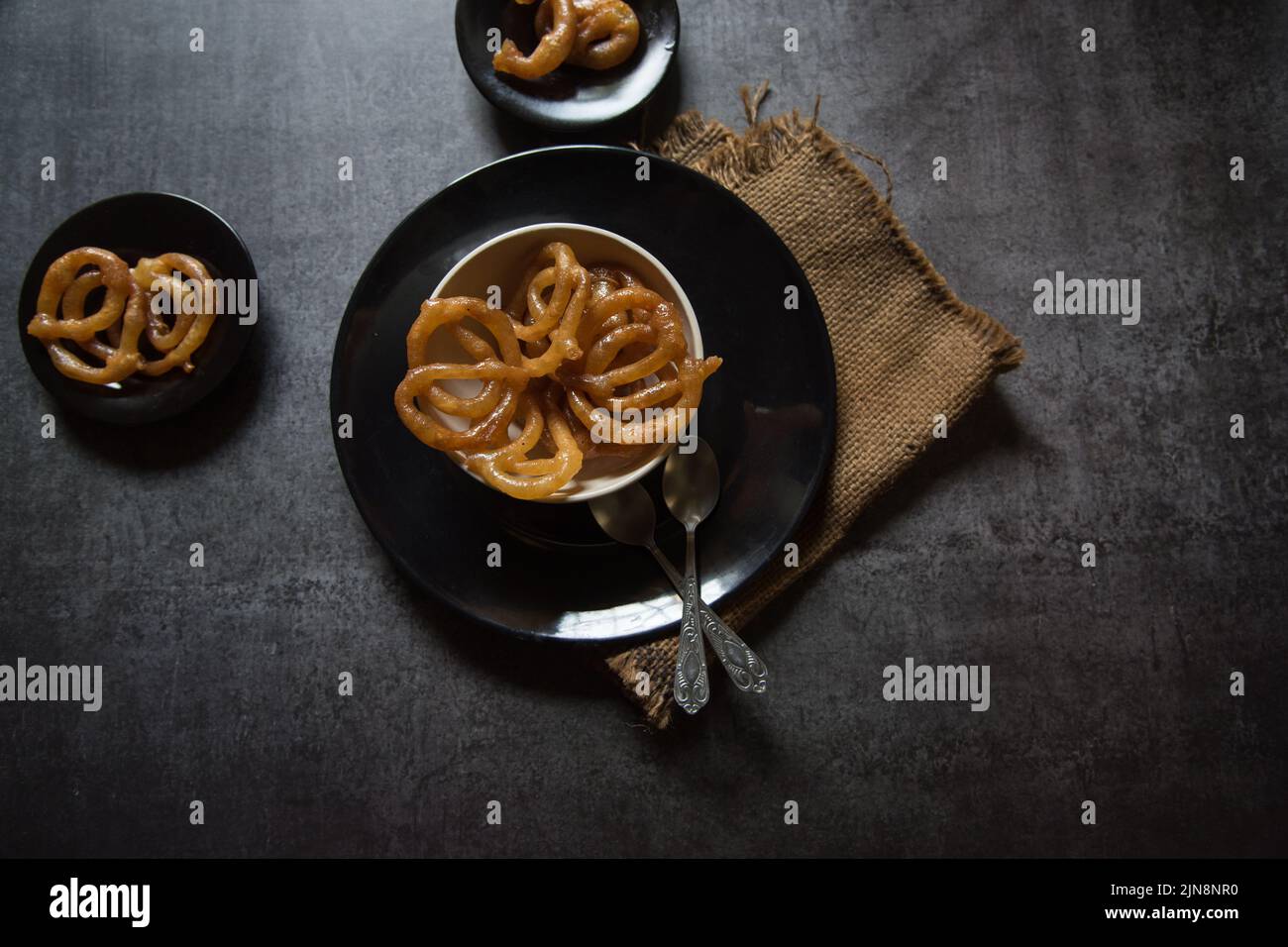 Indian sweet pieces of jalebi or imarti served Stock Photo - Alamy