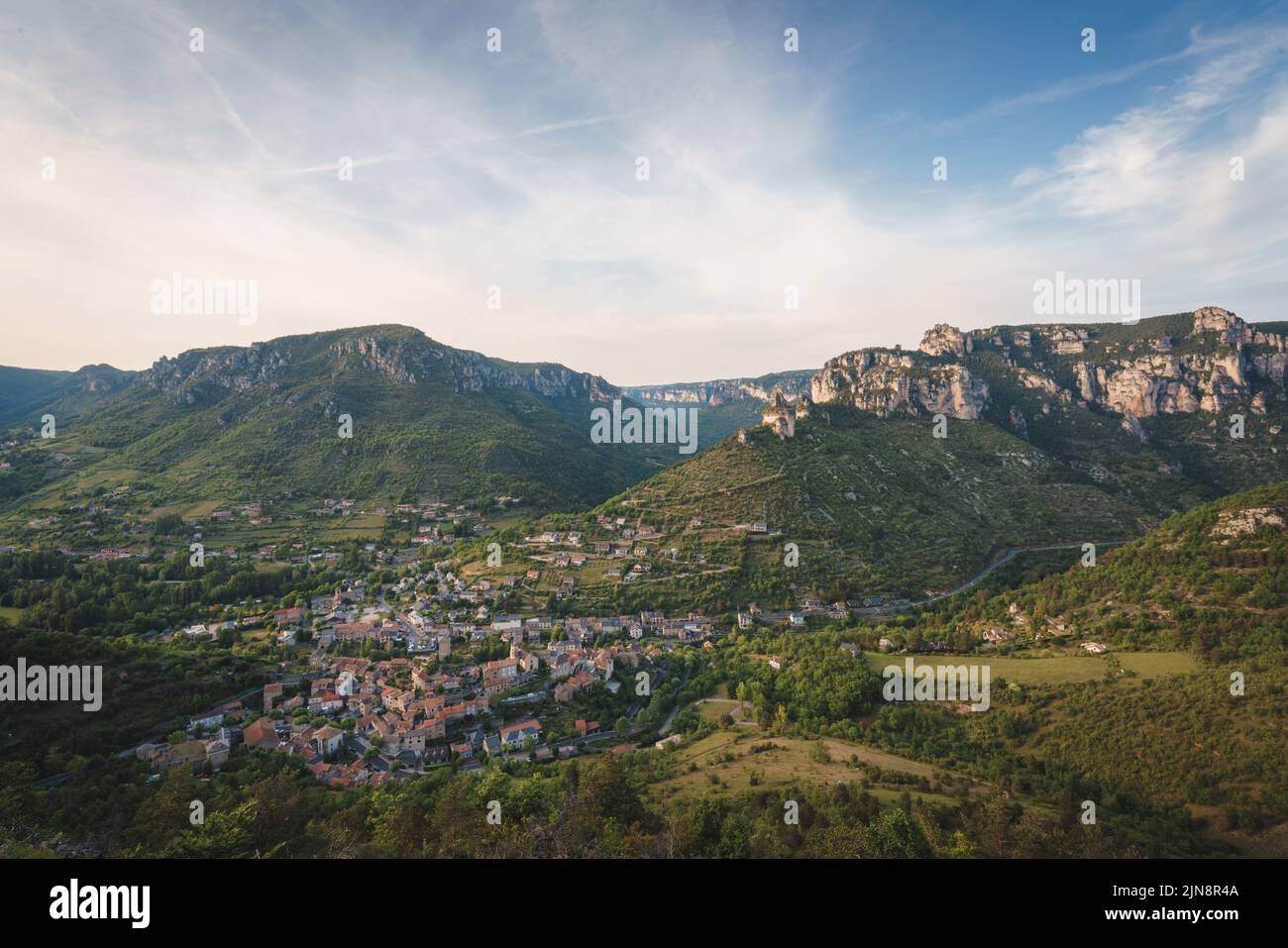 Aerial view of a medieval village, the Rozier agains mountain peak in ...