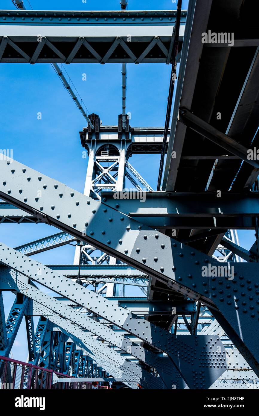 A vertical bottom view of metal structure of Williamsburg Bridge, in ...