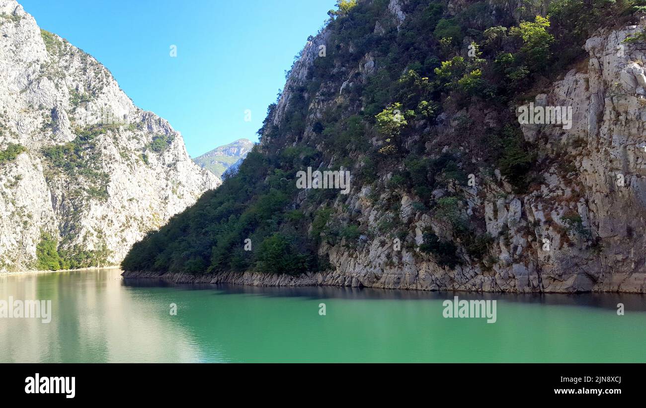 Lake Koman is a reservoir on the Drin River in northern Albania ...