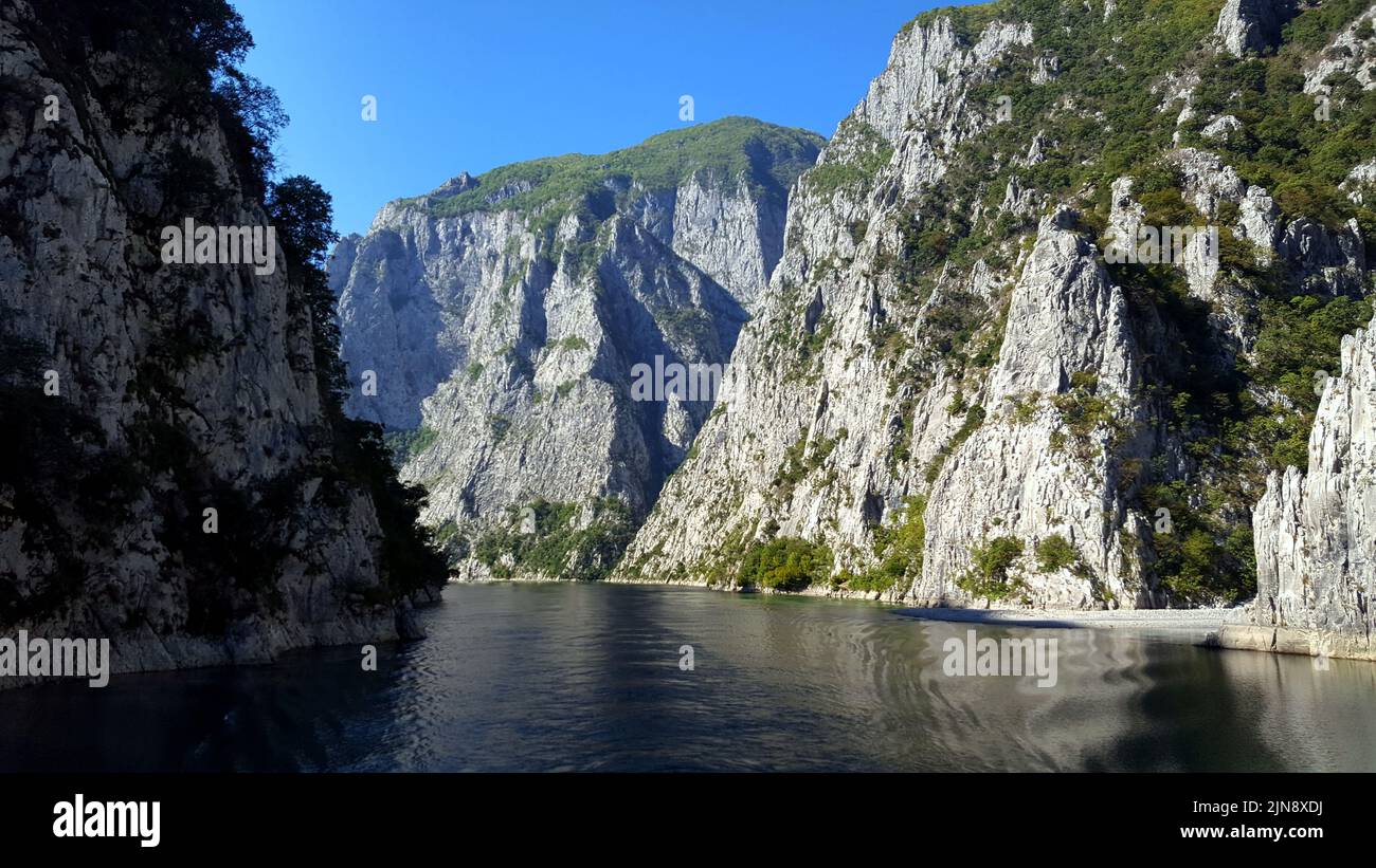 Lake Koman is a reservoir on the Drin River in northern Albania ...