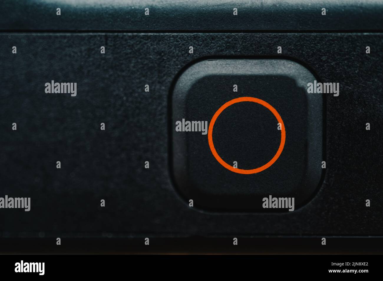 Square shaped shutter button on action camera Stock Photo - Alamy