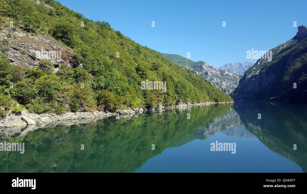 Lake Koman is a reservoir on the Drin River in northern Albania ...