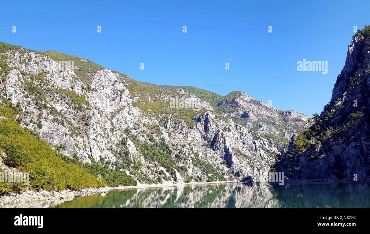 Lake Koman is a reservoir on the Drin River in northern Albania ...