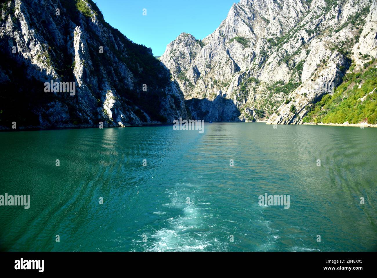Lake Koman is a reservoir on the Drin River in northern Albania ...