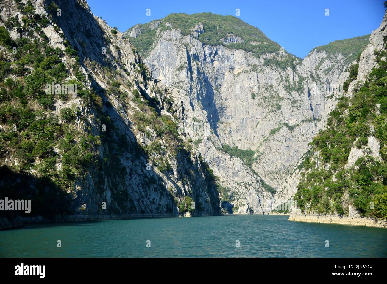 Lake Koman is a reservoir on the Drin River in northern Albania ...
