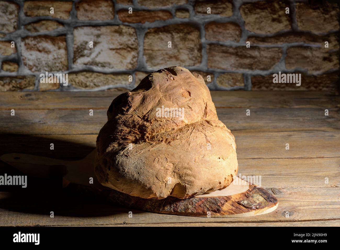 The bread of Matera, Pane di Matera on rustic wooden background ...