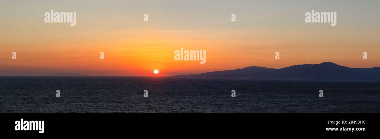 An aerial view of beautiful seascape in background of hills during ...