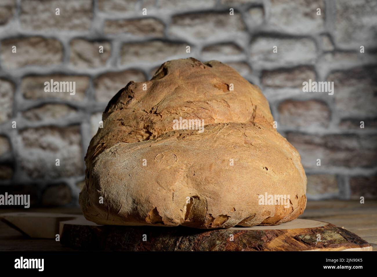 The bread of Matera, Pane di Matera on rustic wooden background ...