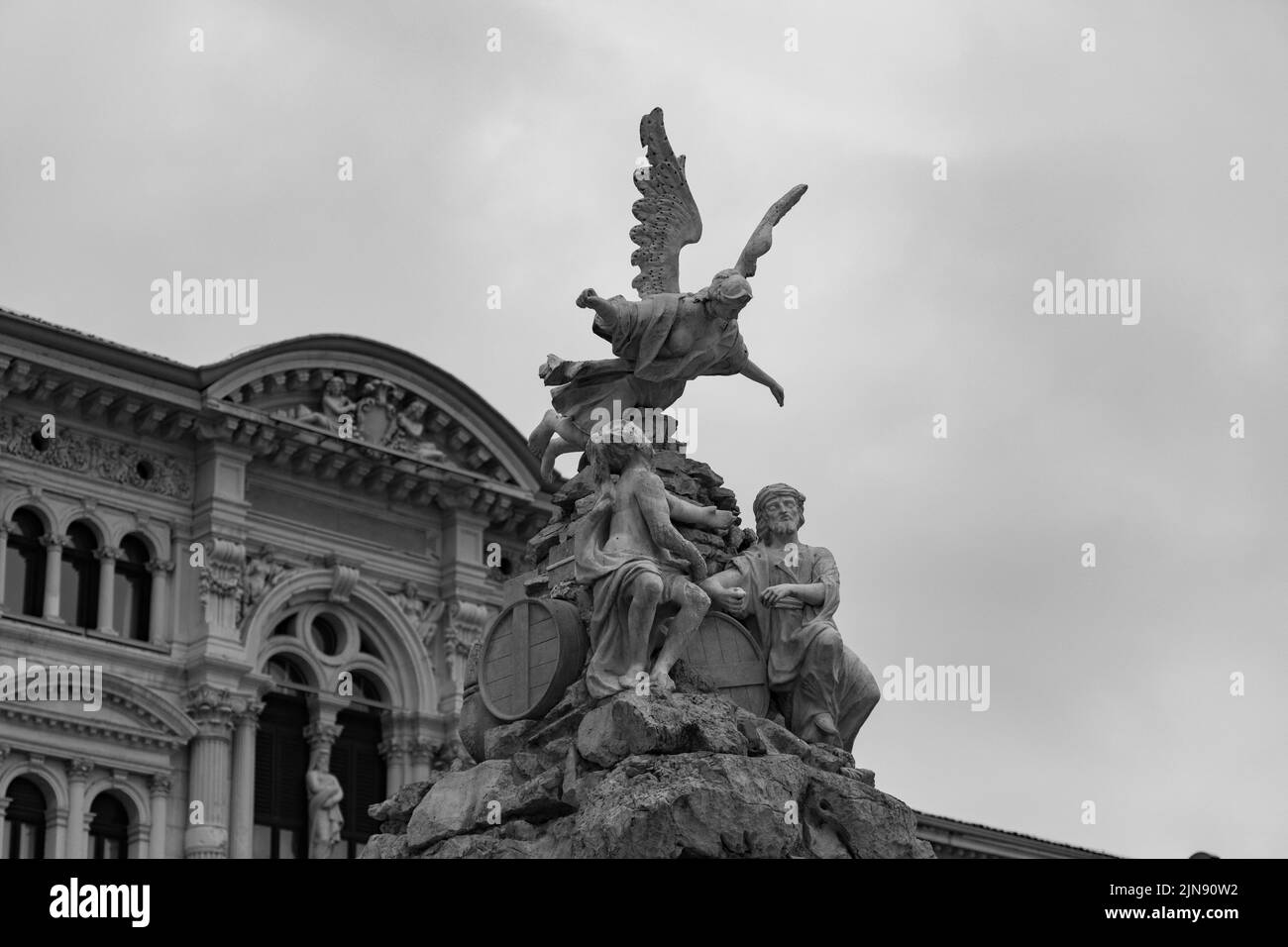 A grayscale of sculpture of an angel in Trieste, Italy Stock Photo - Alamy