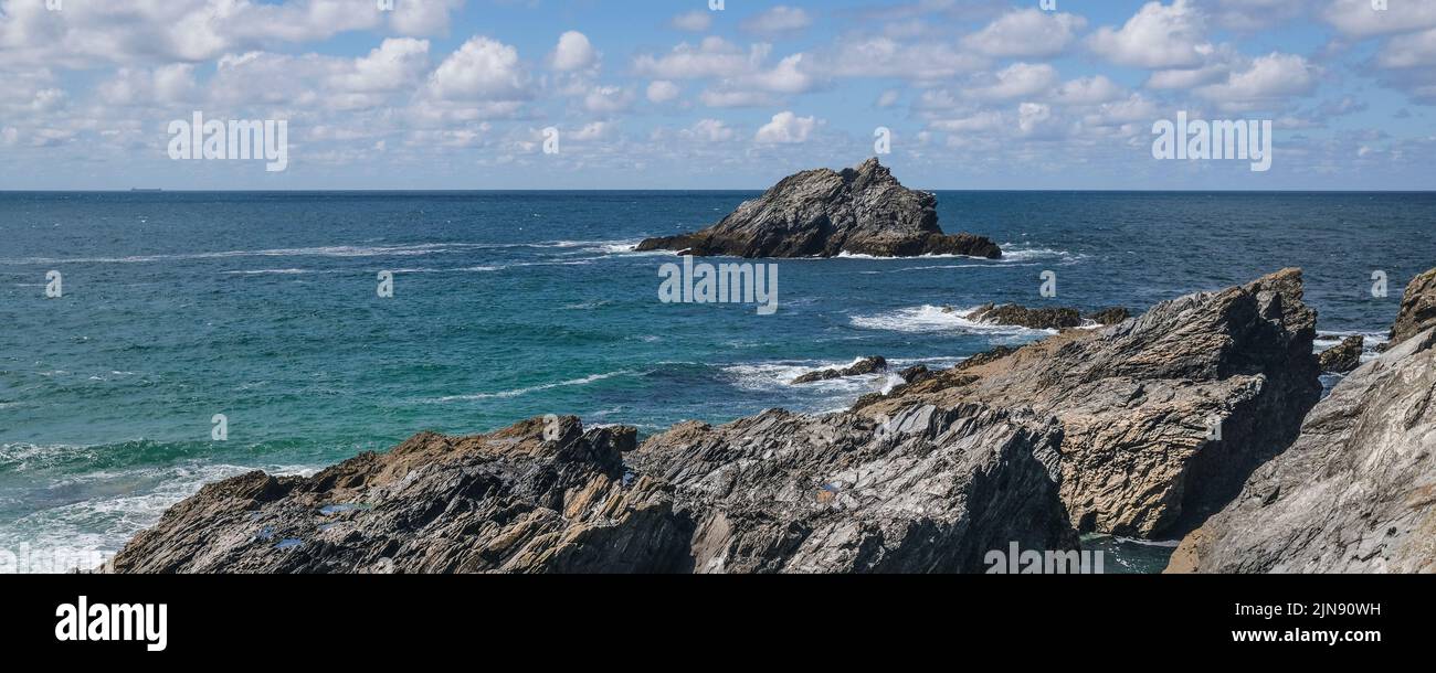 A panoramic image of the rocky island The Goose off the rugged rocks on ...