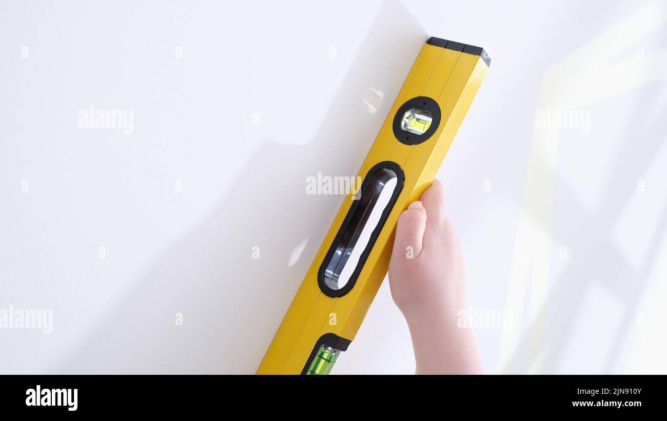 Professional yellow measuring device for level and evenness of wall ...
