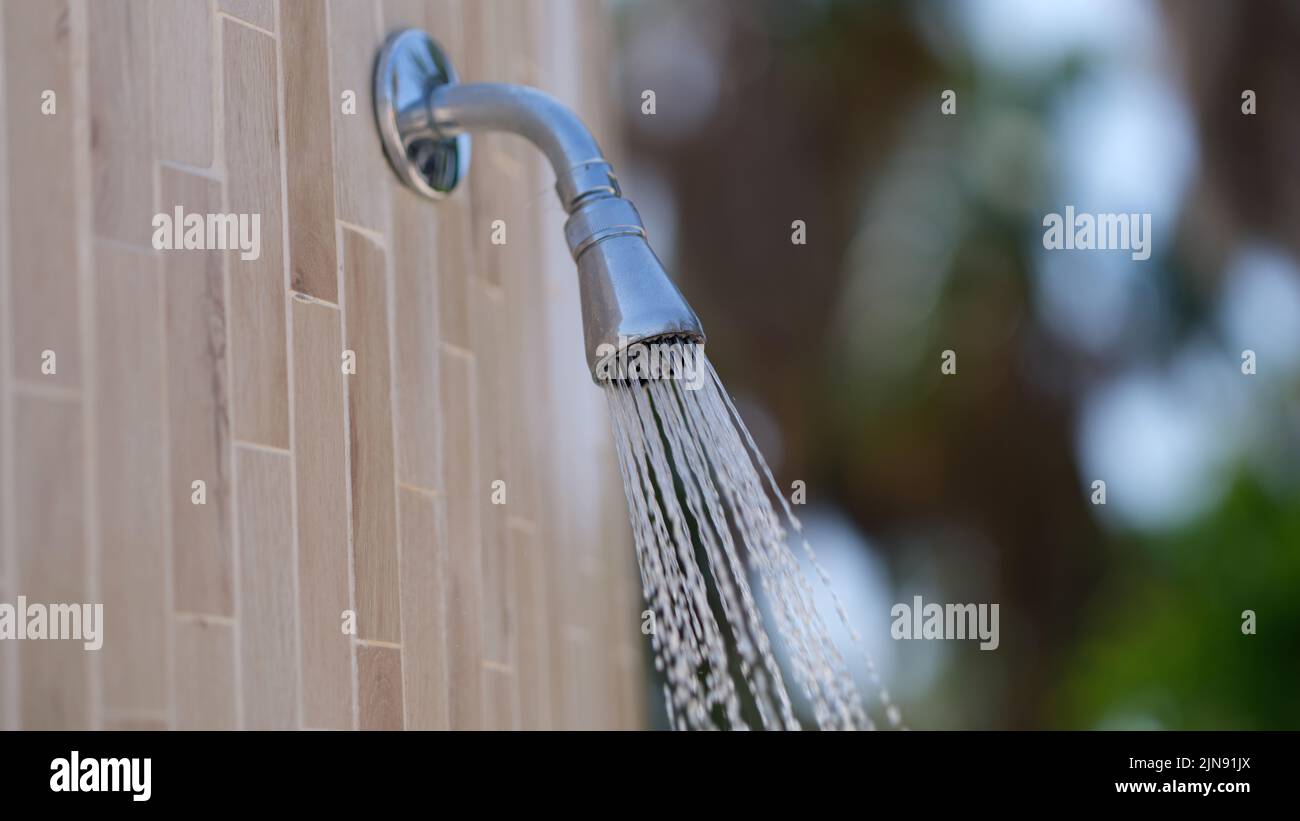 Outdoor tropical beach shower by pool or sea Stock Photo - Alamy