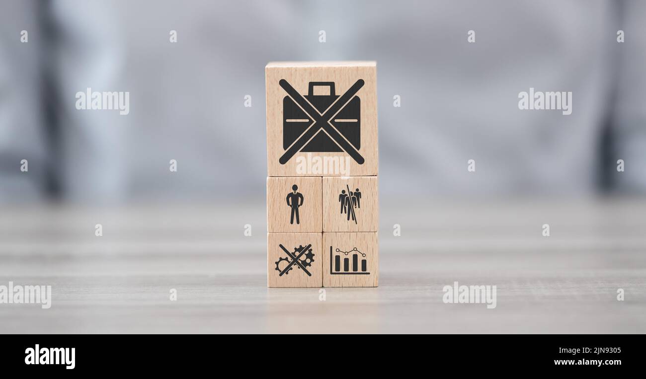 Wooden blocks with symbol of job loss concept Stock Photo - Alamy