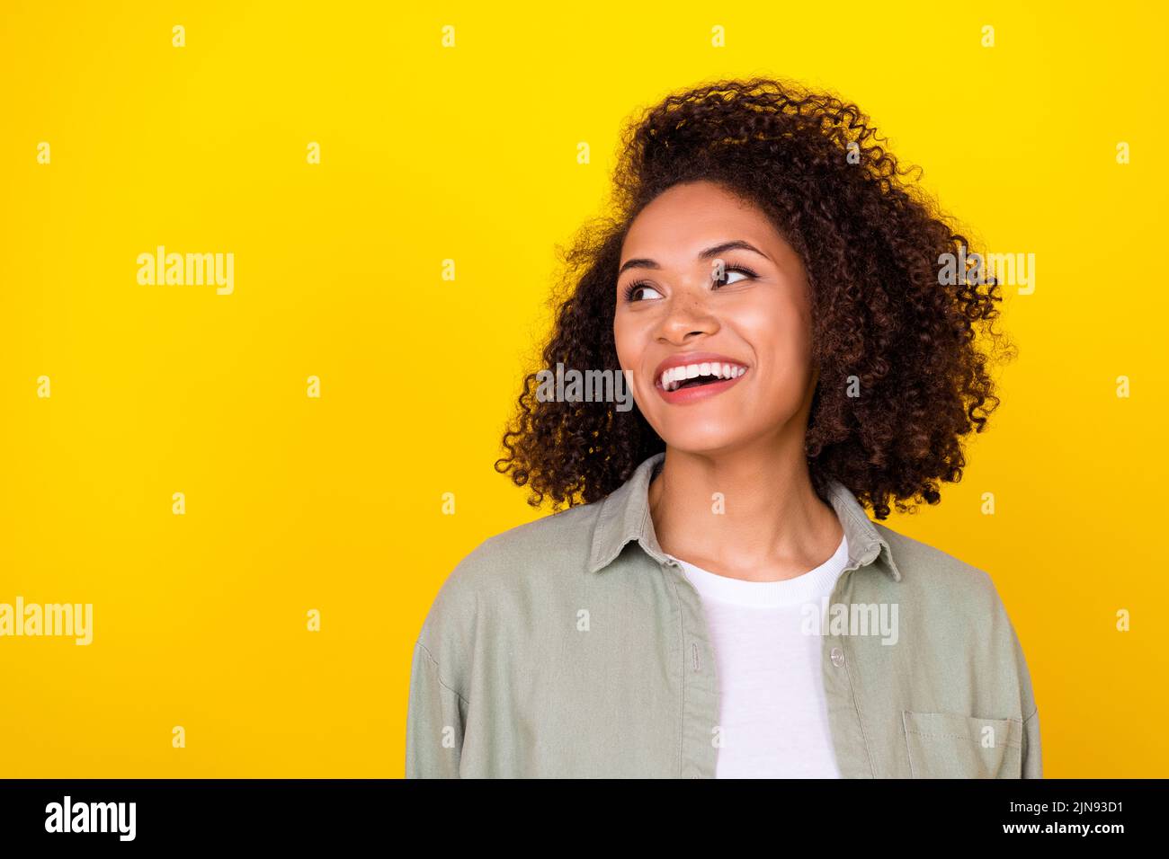 Photo of positive excited lady worker look empty space smiling toothy ...