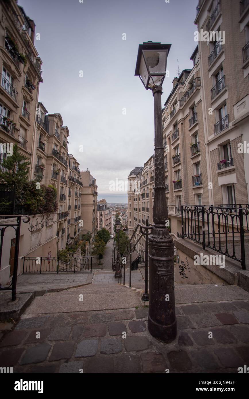 Paris, narrow alleyway steps and lamppost Stock Photo - Alamy
