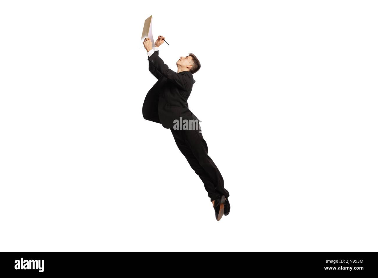 Sign contract. Young office worker in business suit jumping with papers ...