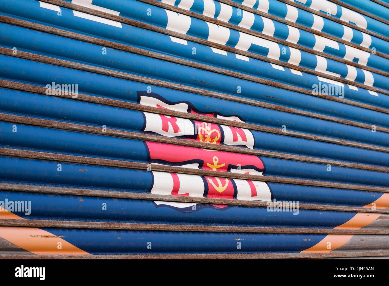 An RNLI flag painted onto a launch shed, near Happisburgh, Norfolk ...