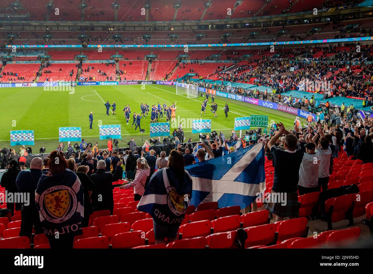 Scotland players and fans in a Covid-19 restricted Wembley crowd after ...