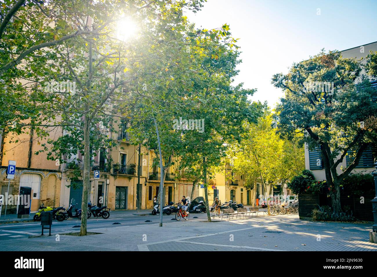 View of street of Barcelona Poble Nou neighborhood on a summer day with ...