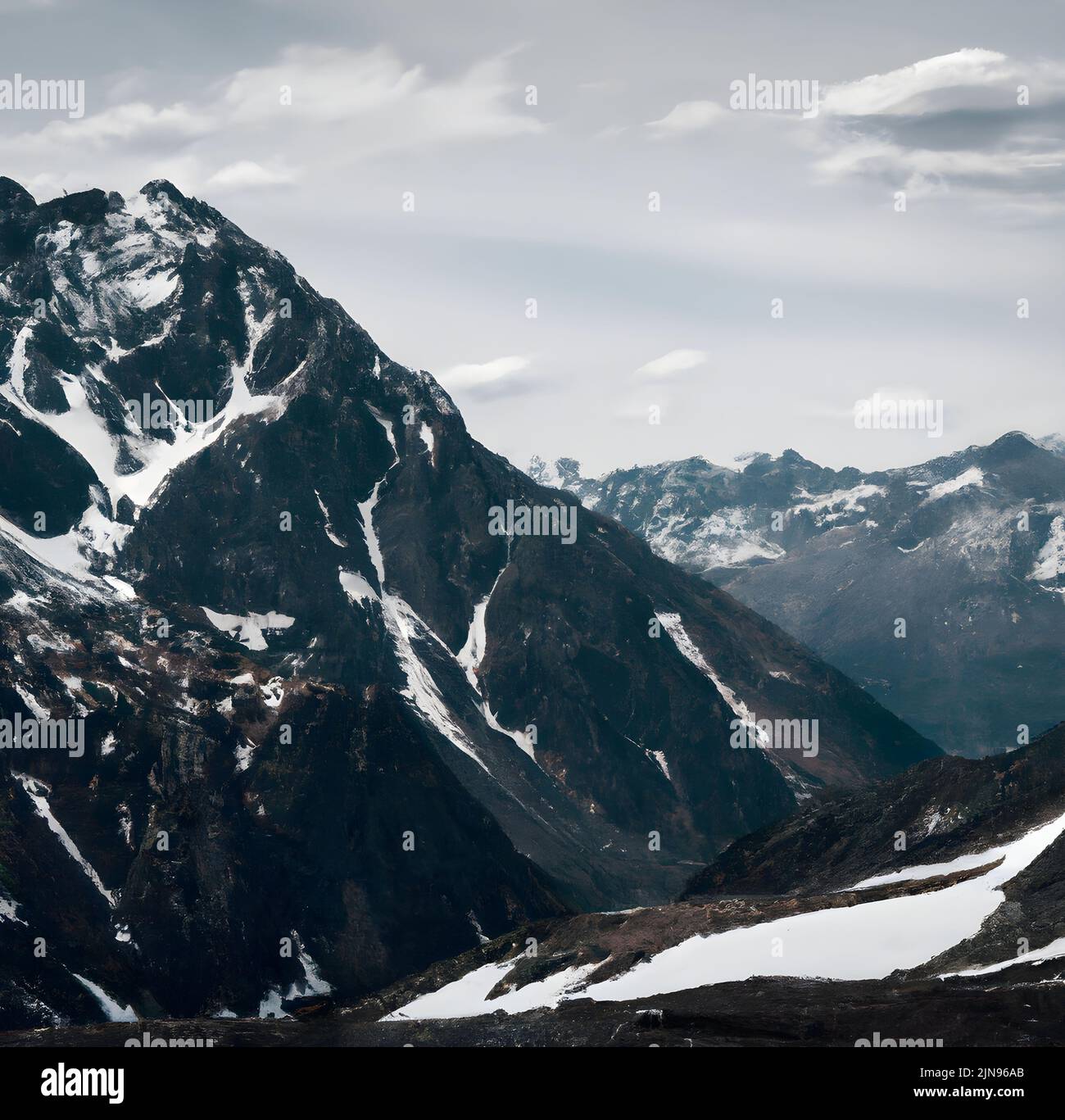A landscape of rocky mountains covered in snow under a cloudy sky on a gloomy day Stock Photo ...