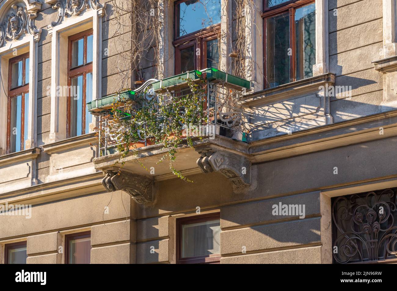Old apartment buildings and balcony in Krakow, Poland. Architecture ...