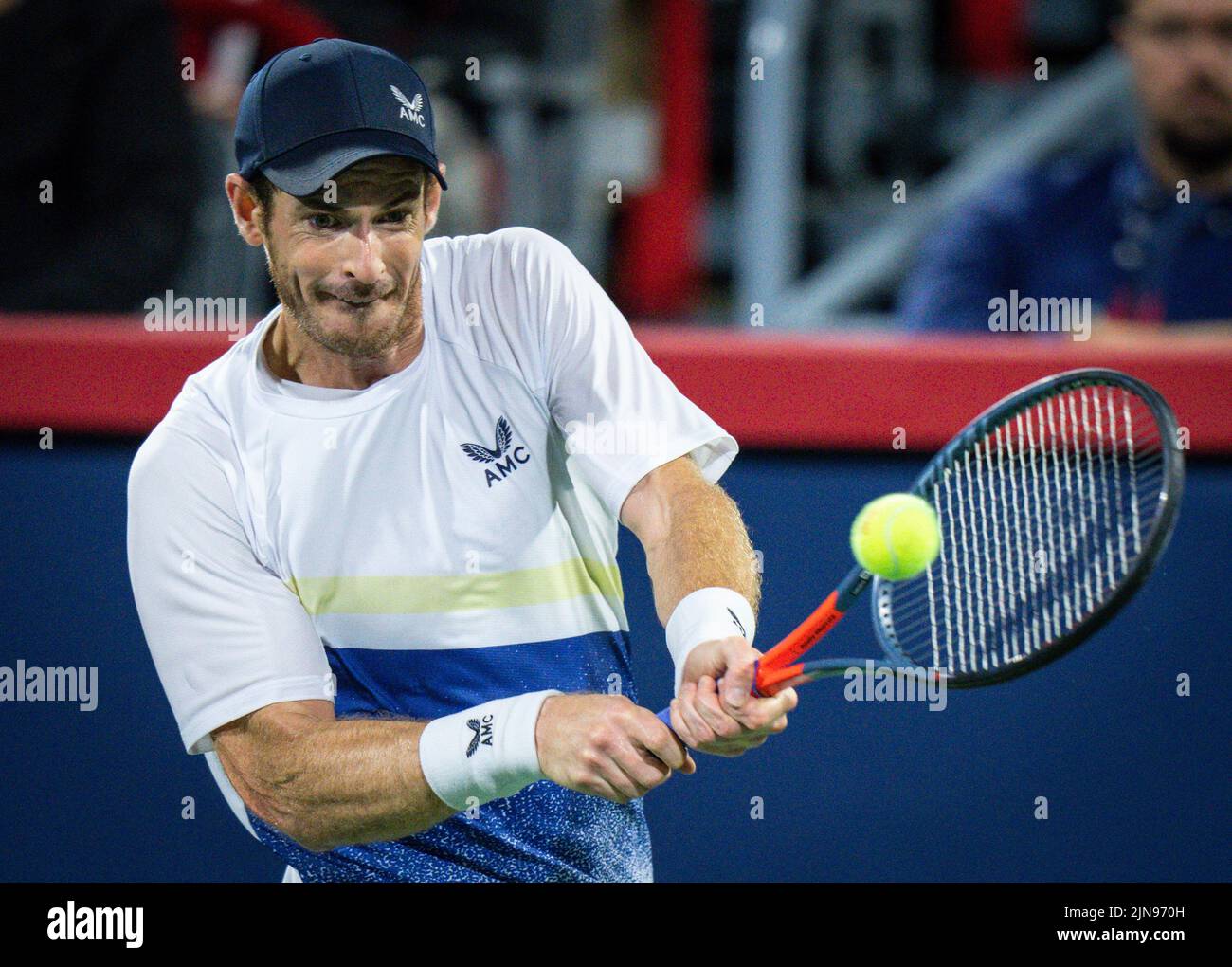 Andy Murray of England hits a shot during his match against Taylor ...