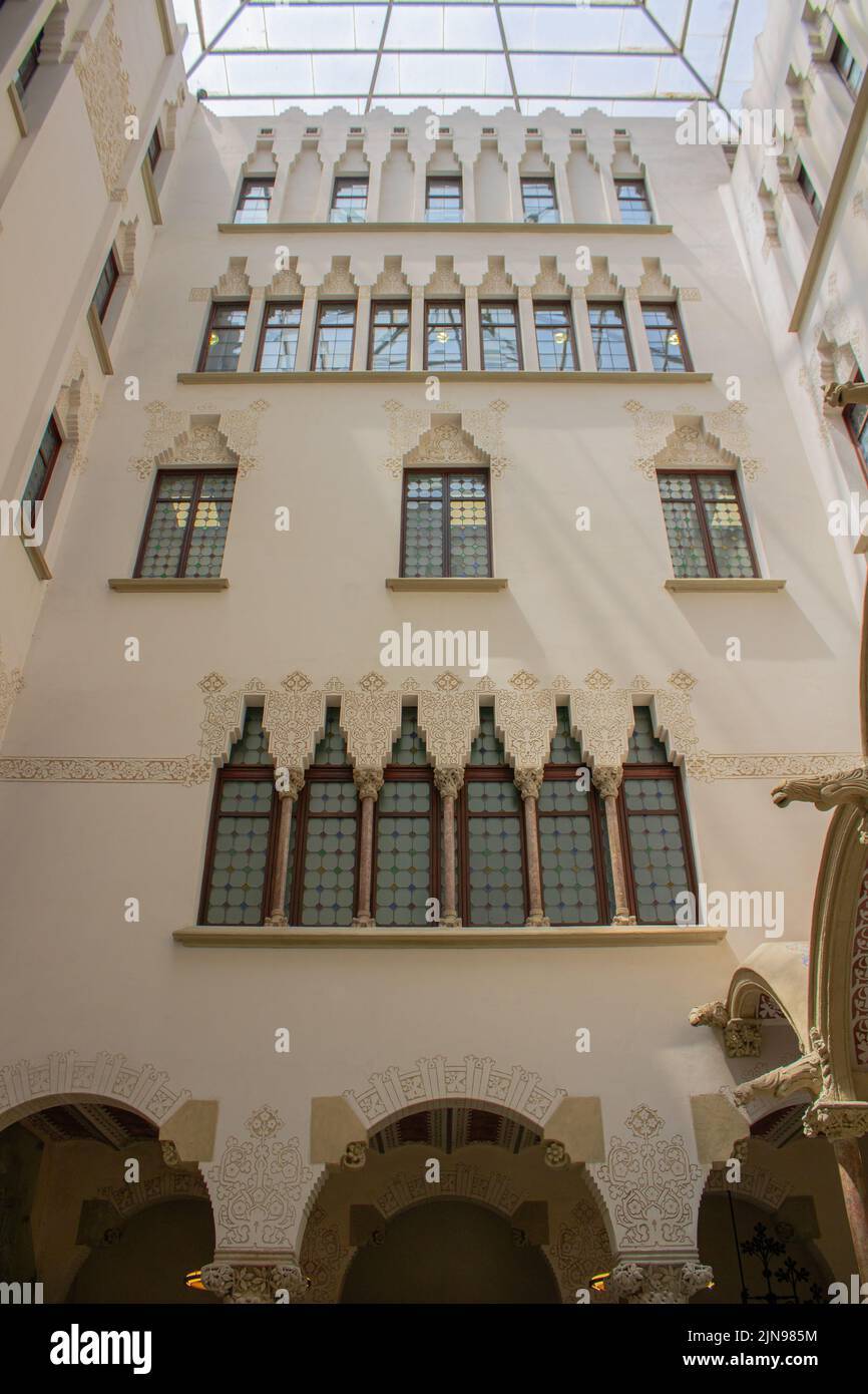 Vertical photo of the inside of a building with a classic mediteranean ...