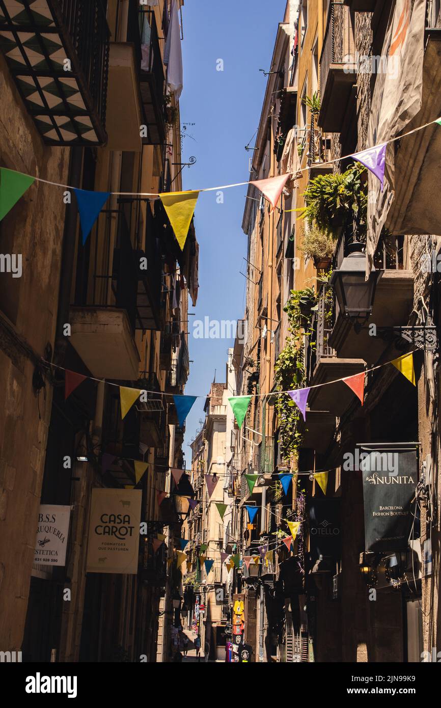 Vertical photo of a street of the gothic area in Barcelona, Spain with ...