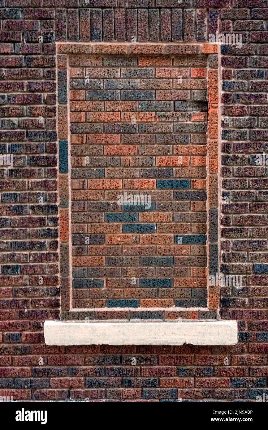 window closed up with red bricks on a building in Wooster Ohio Stock ...