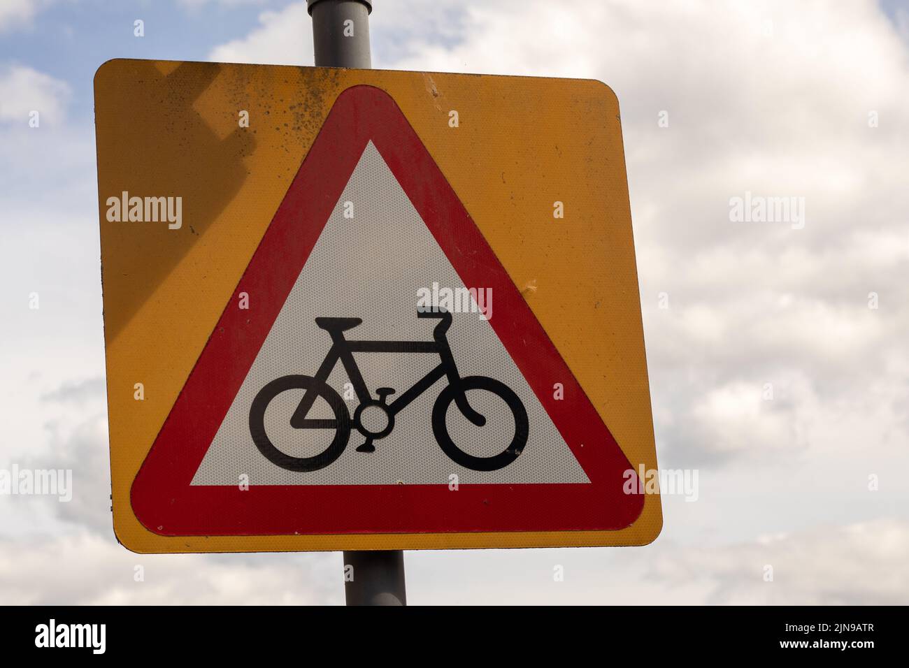 A warning sign in a red triangle meaning Stock Photo - Alamy