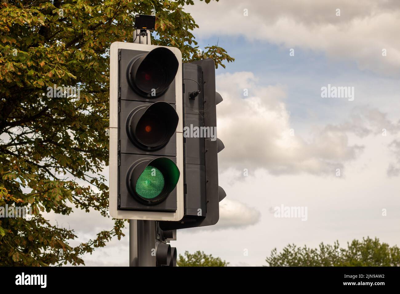 A set of traffic lights with the green light on for go Stock Photo - Alamy