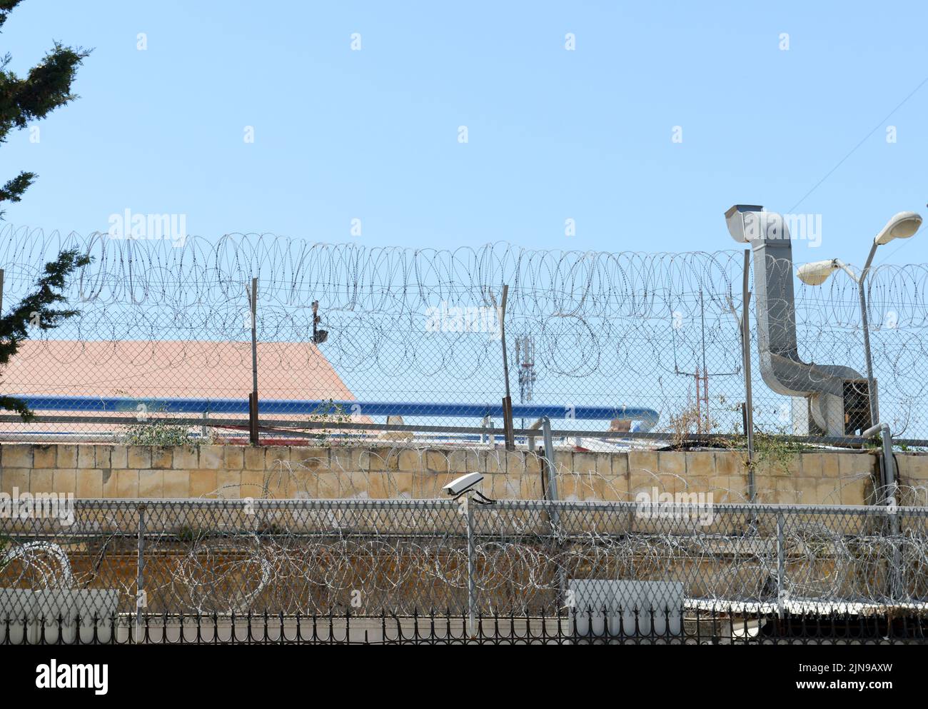Barbed wires of Migrash Harusim jail at the police station in Russian ...