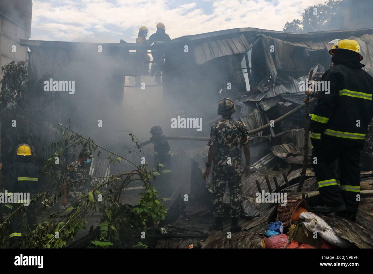 On August 10, 2022 in Kathmandu, Nepal. Firefighters with the help of ...