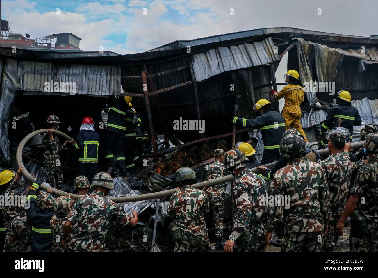 On August 10, 2022 in Kathmandu, Nepal. Firefighters with the help of ...