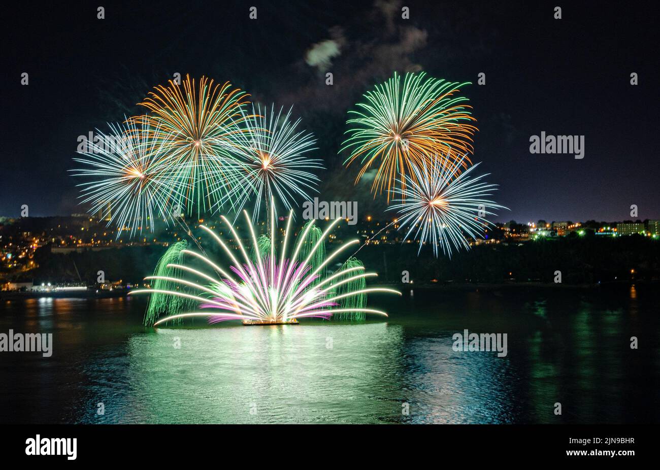 The colorful fireworks on the St Lawrence River, in Quebec City Stock ...