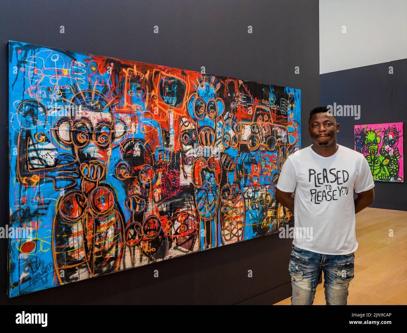 London, UK. 10th Aug, 2022. Aboudia with his work - All the works are ...