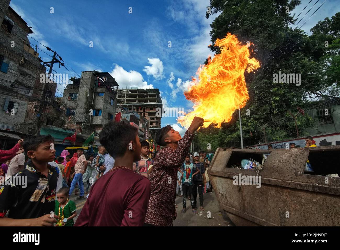 People participate in Ashura traditions in the Bihari Camp in Dhaka ...
