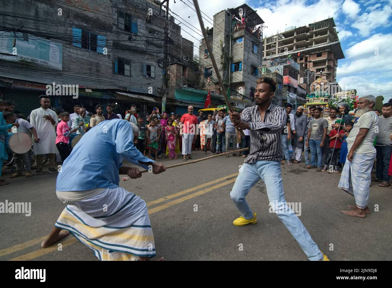 People participate in Ashura traditions in the Bihari Camp in Dhaka ...