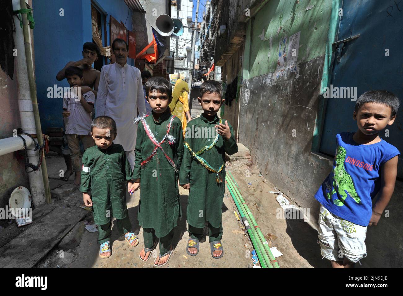 People participate in Ashura traditions in the Bihari Camp in Dhaka ...