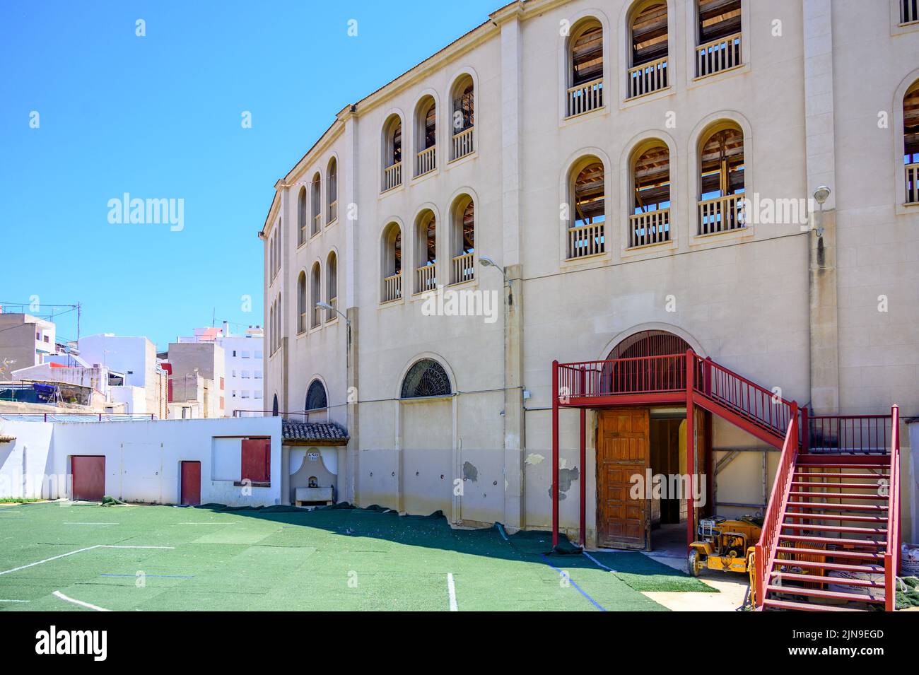 Bullring building exterior architecture. A small backyard where staff ...