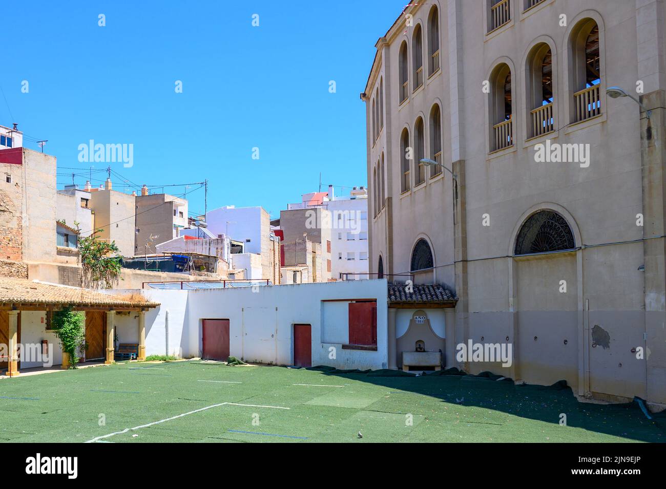 Bullring building exterior architecture. A small backyard where staff ...