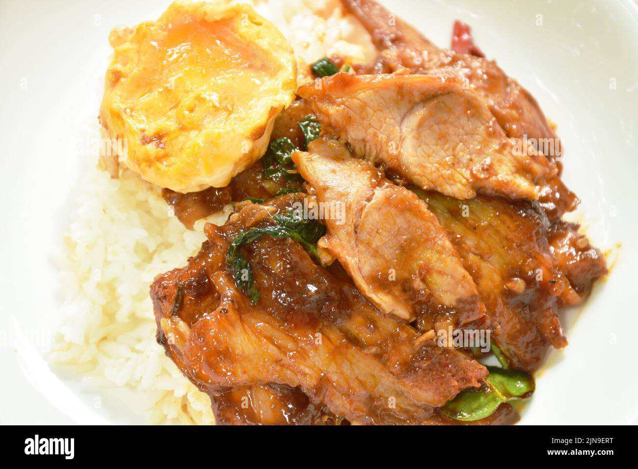 spicy stir fried barbecue pork neck with chili and basil leaf curry ...