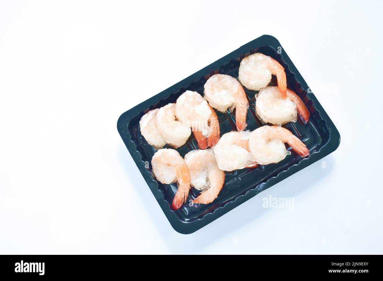 raw shrimp food ingredient arranging on plastic tray in white ...