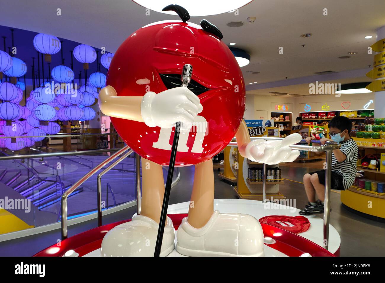 SHANGHAI, CHINA - AUGUST 10, 2022 - Customers shop at the M&M chocolate ...