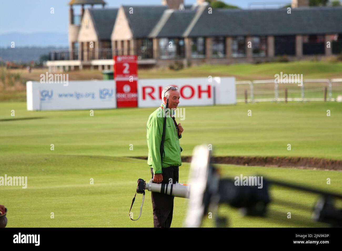 Legendary golf photographer David Cannon on the 18th hole during pro-am ...