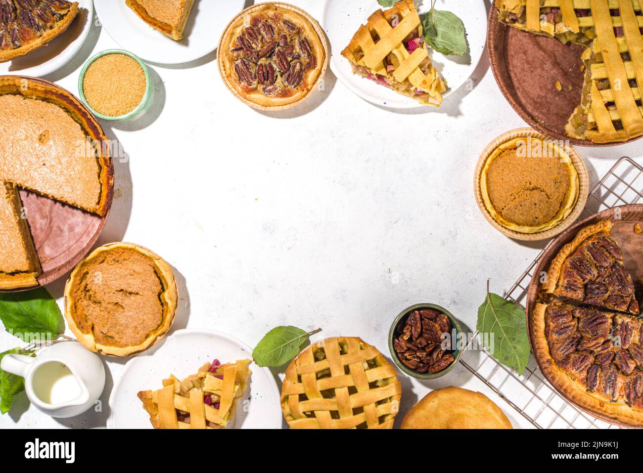 Set variety autumn pies. Pecan, apple, pumpkin small tart cakes and ...