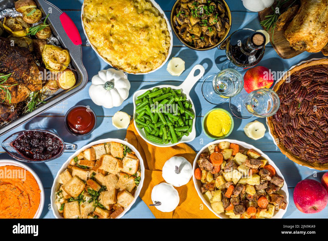Thanksgiving dinner table with new traditional thanksgiving food ...
